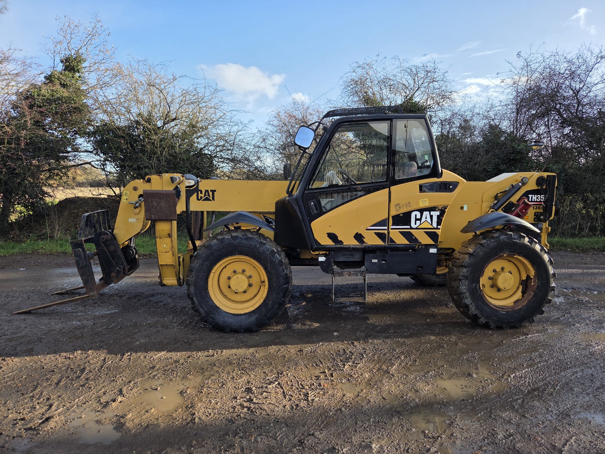 Caterpillar TH355B - BRUCE ATFIELD